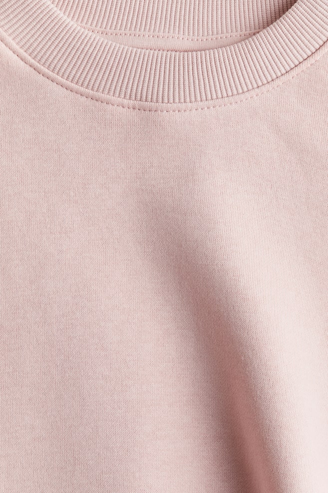 Light dusty pink Oversized Brushed-Inside Sweatshirt for kids | H&M US