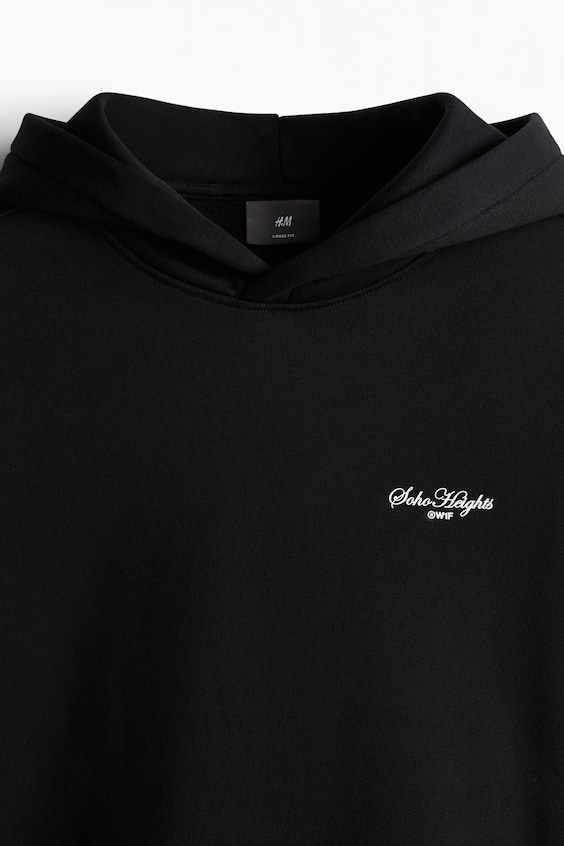 Loose Fit Motif-detail hoodie - Black - Men | H&M GB