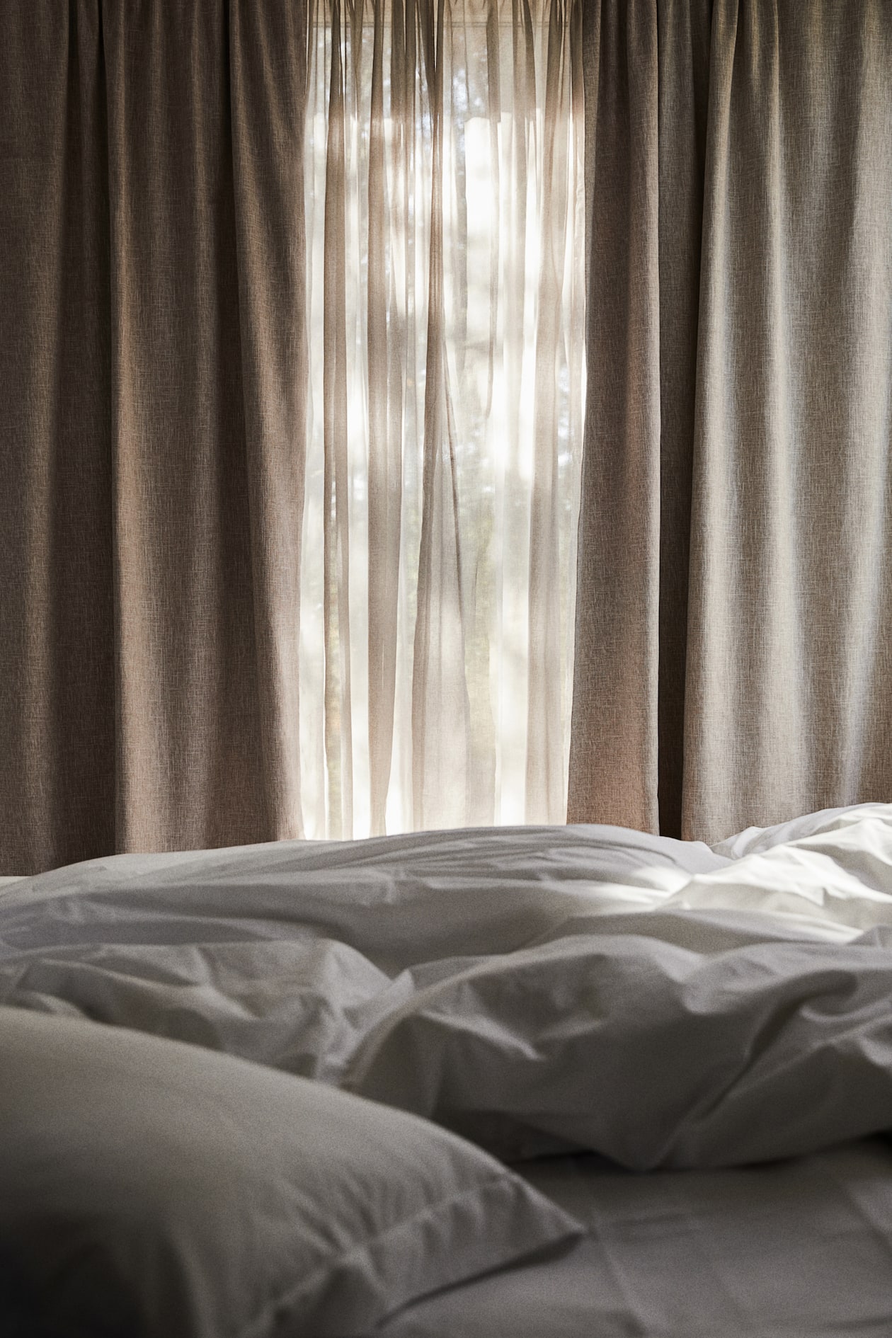 Light beige Single-pack Wide Blackout Curtain Panel at H&M Home | H&M US