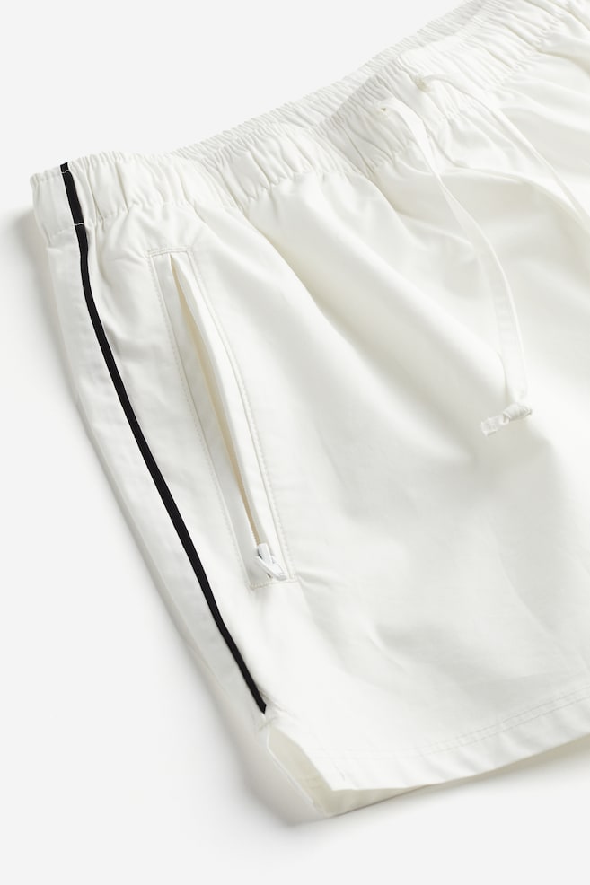 Women's Cream Piping-detail pull-on shorts | H&M IN