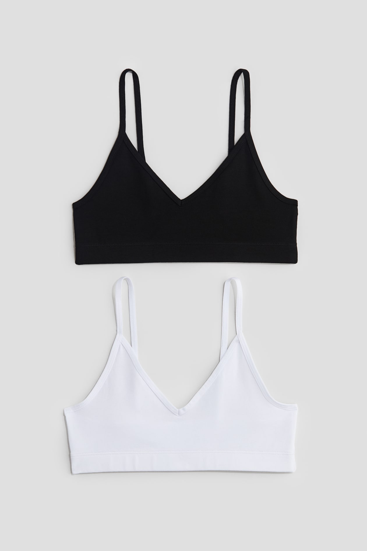 Set de 2 topuri scurte cu decolteu în V - Negru/alb - COPII | H&M RO