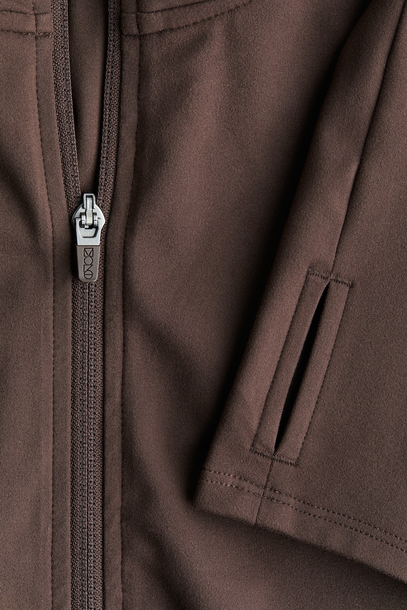 Chamarra deportiva con zíper con SoftMove™ - Café oscuro - Ladies | H&M MX