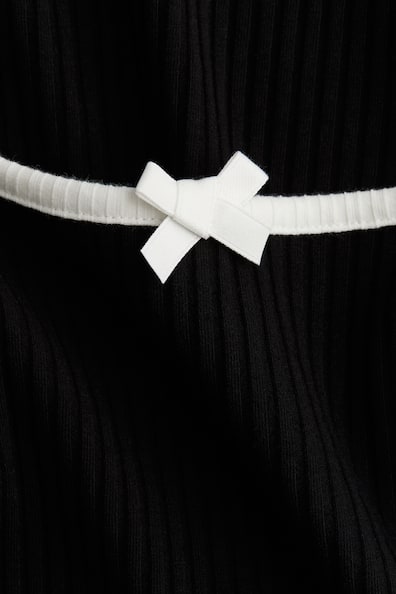 Ribbed Top with Overlocked Trim - Black - Ladies | H&M US