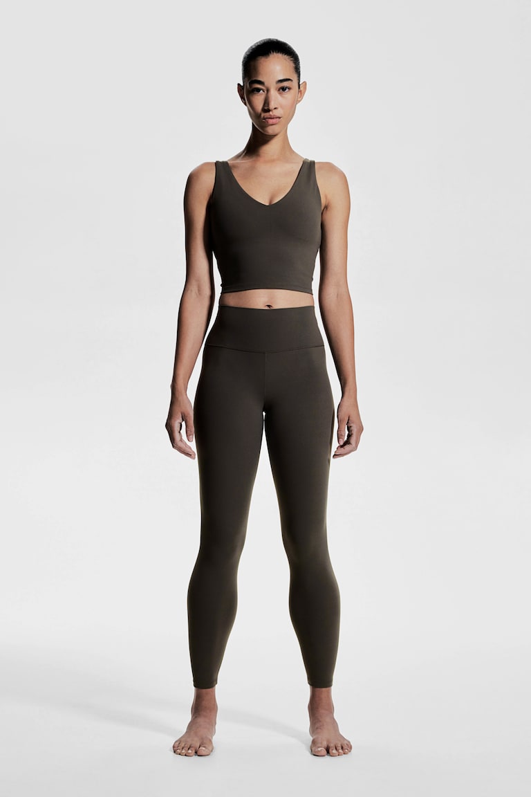 Light Support Yoga Bra with SoftMove™ Lycra® - Dark gray - Ladies | H&M US